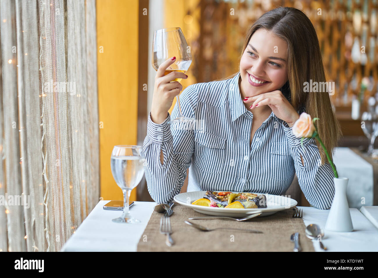 Lifestyle. Beautiful woman in modern restaurant Stock Photo - Alamy
