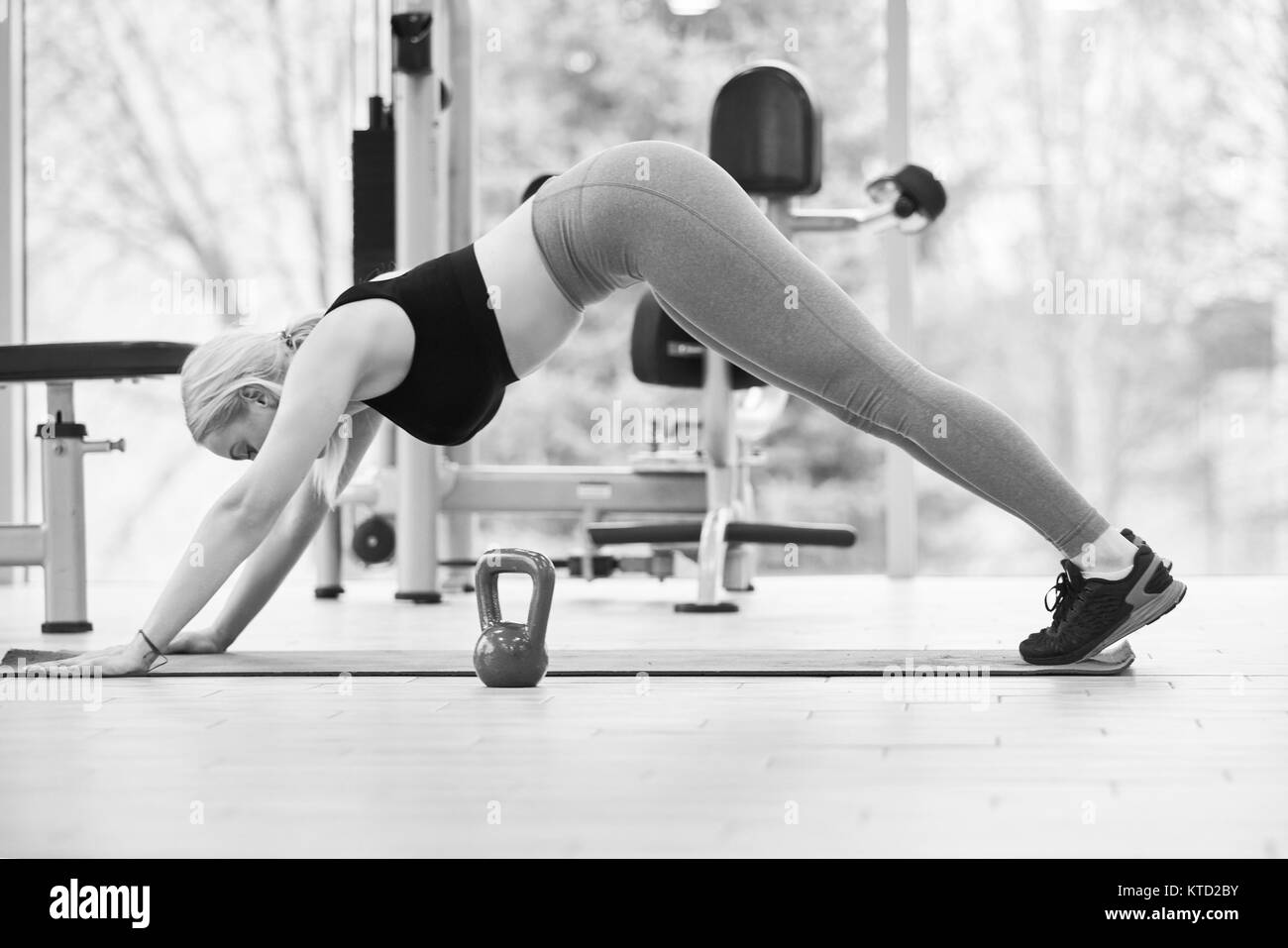 Kettlebell training in modern gym Stock Photo - Alamy