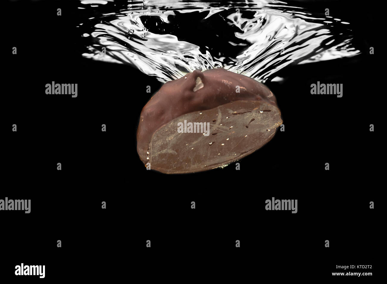 Marshmallow in chocolate,water splash Stock Photo - Alamy