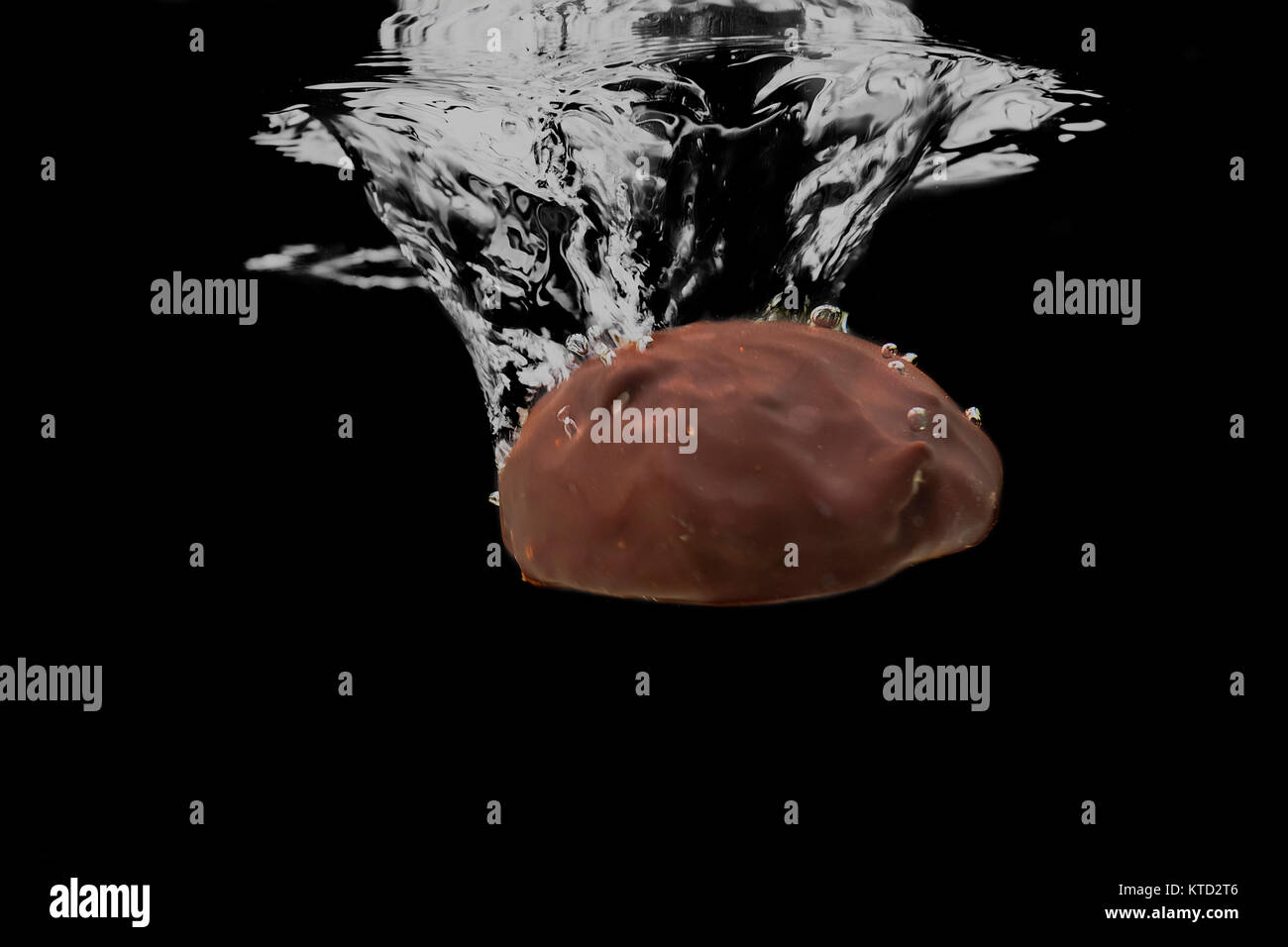 Marshmallow in chocolate,water splash Stock Photo - Alamy