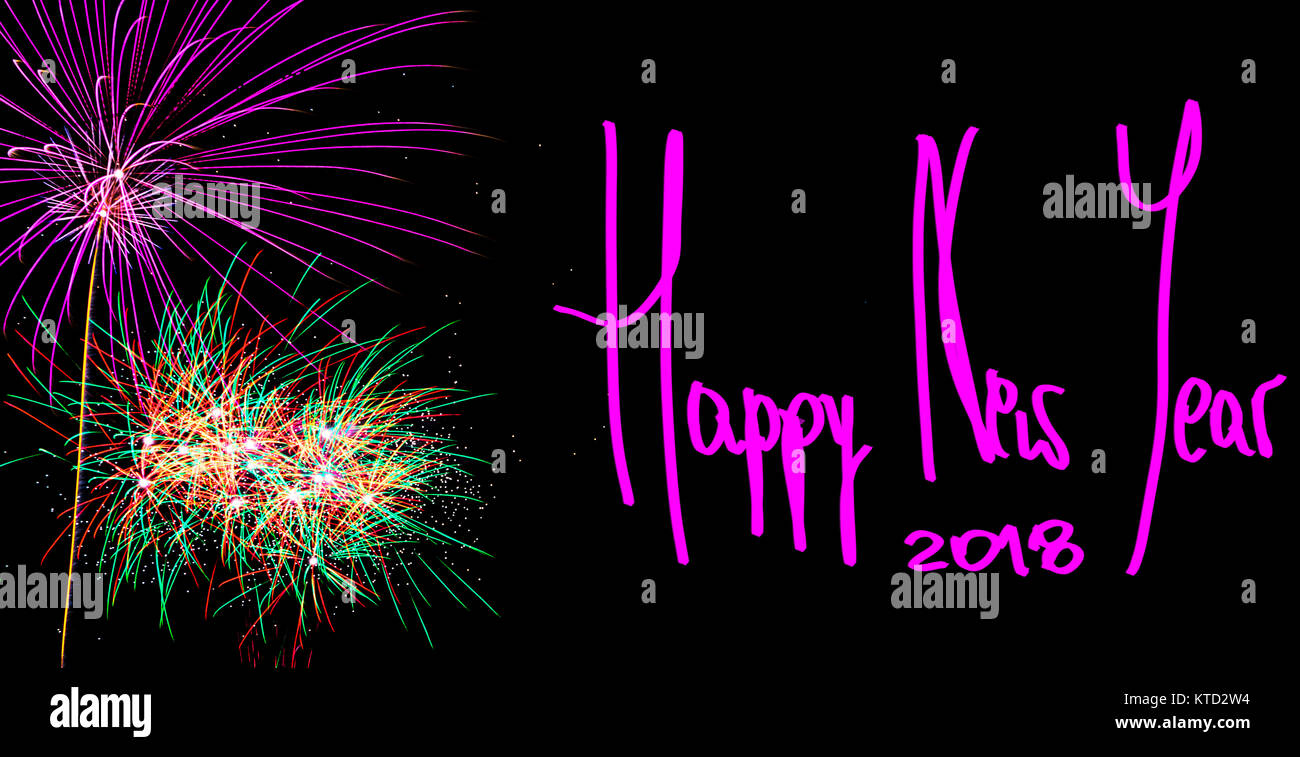 amazing fireworks in the black sky, with handwritten wishes Happy New ...