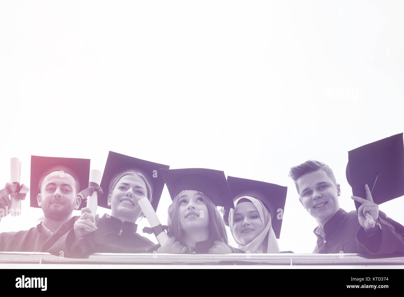 Young people graduating, celebration Stock Photo - Alamy