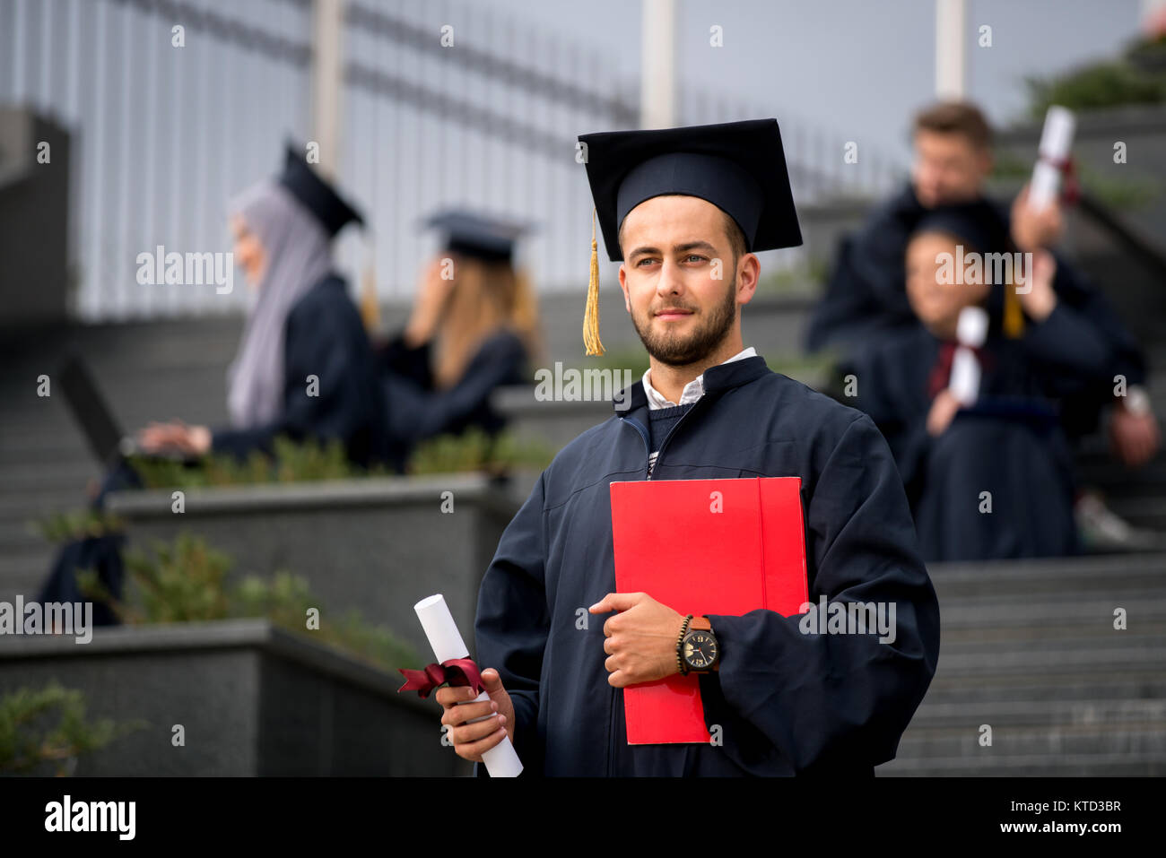 Portrait confident student graduation certificate hi-res stock ...