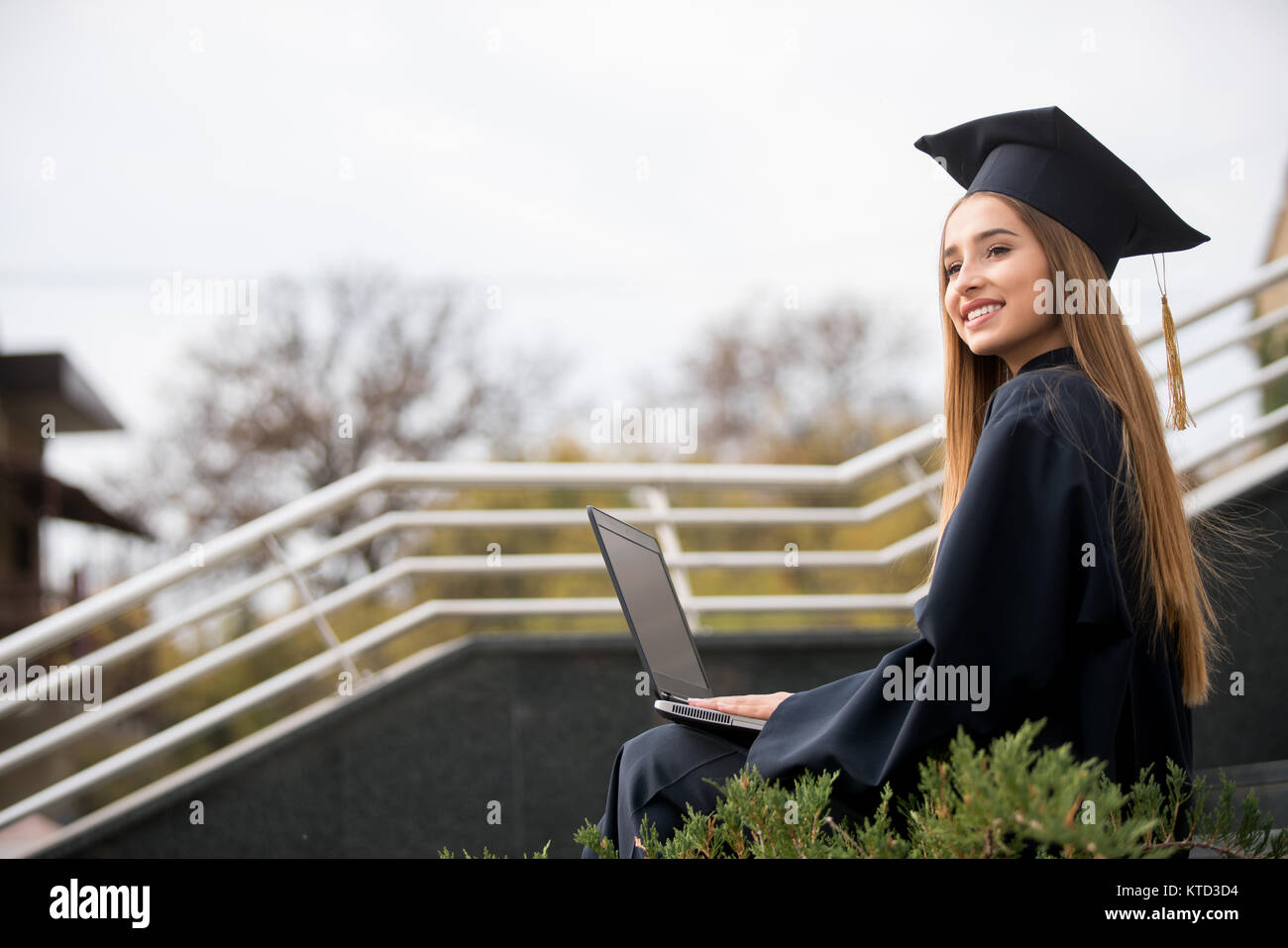 Pretty young girl, graduation day pose, diploma Stock Photo - Alamy