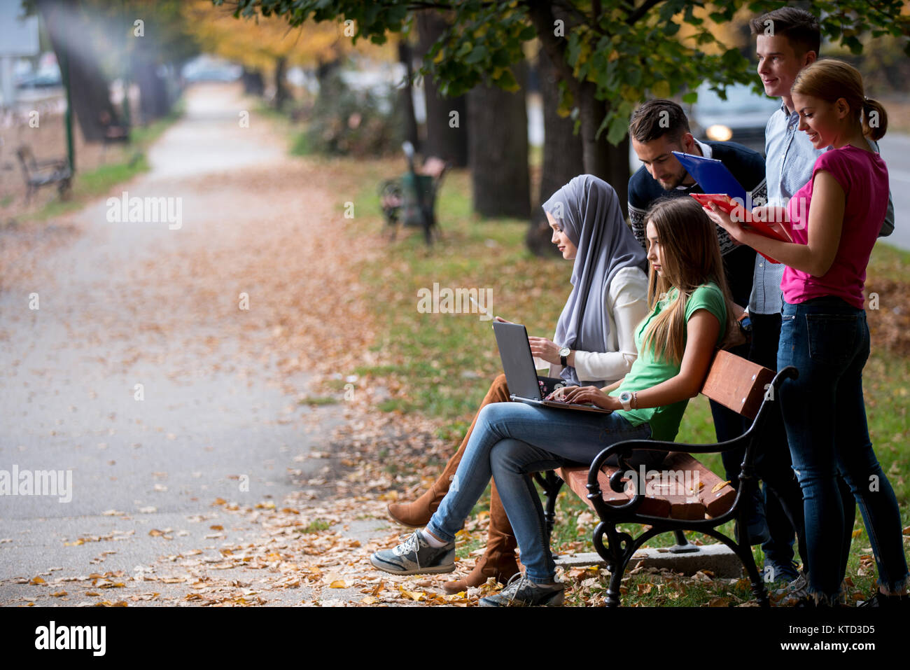 Group of students practicing for exam Stock Photo - Alamy