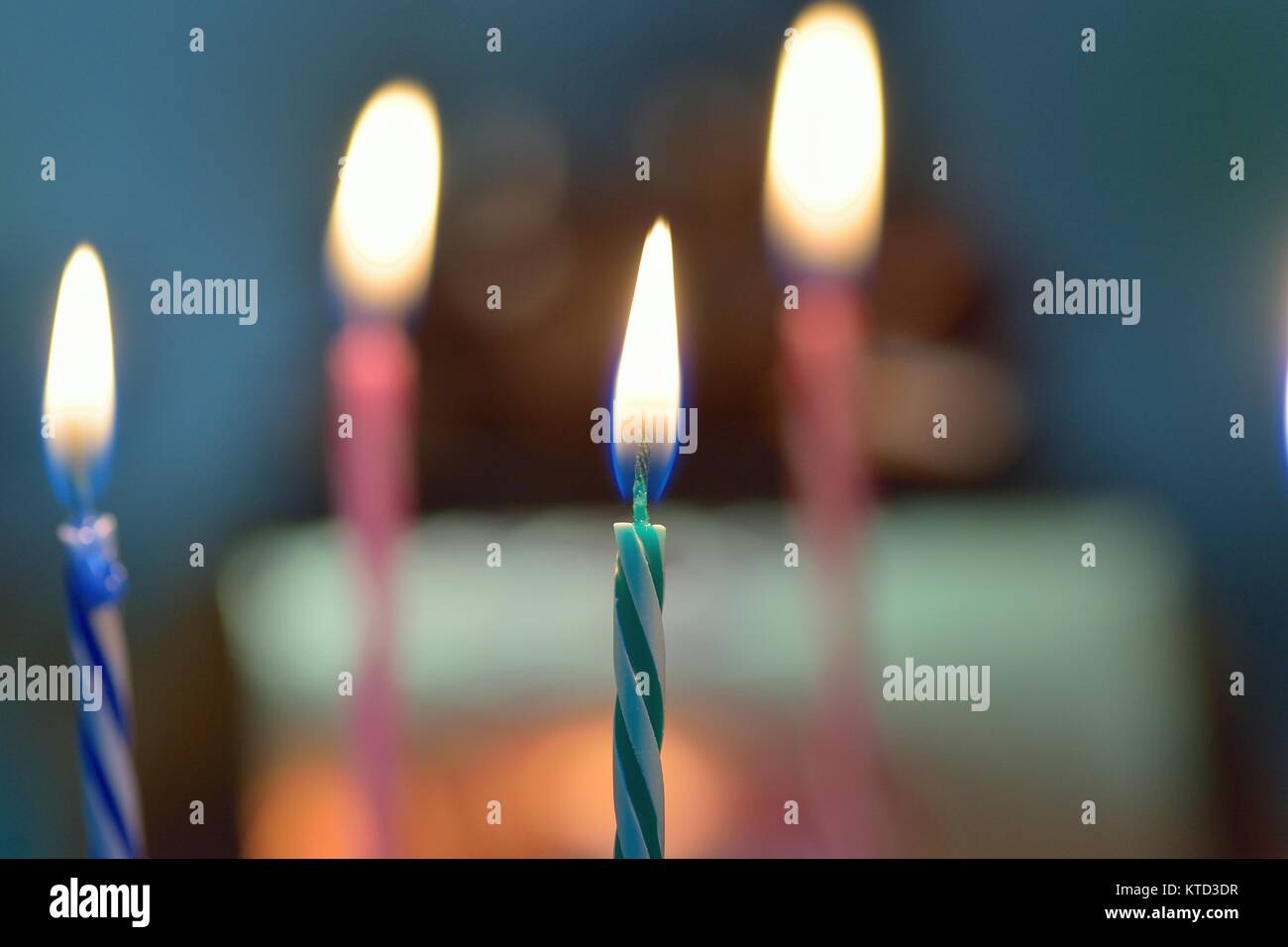 Macro texture of burning colorful birthday cake candles Stock Photo - Alamy