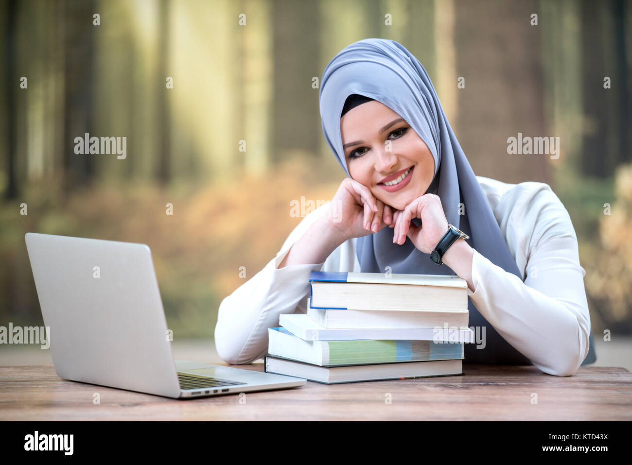 pretty female with hijab school student in classroom, concept, stody ...