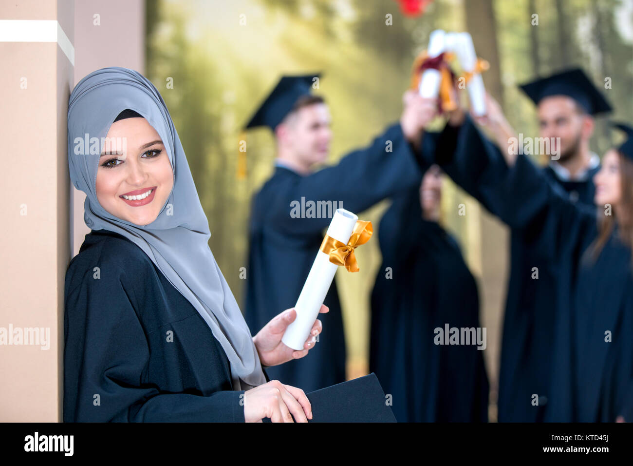Group of Diverse International Graduating Students Celebrating, sitting ...