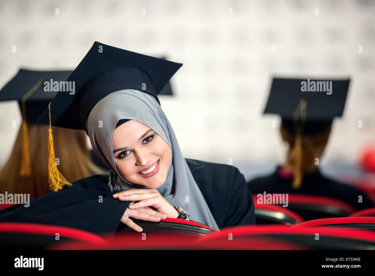 Group of Diverse International Graduating Students Celebrating, sitting ...