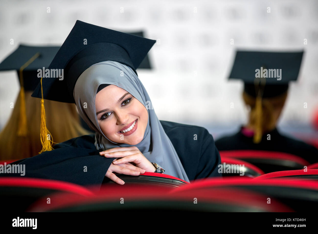 Group of Diverse International Graduating Students Celebrating, sitting ...