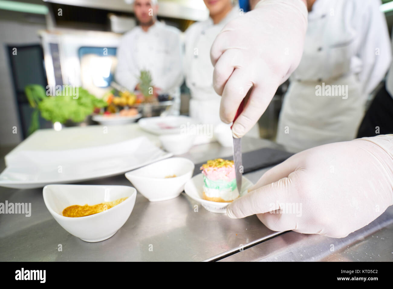 Chef preparing food in restaurant kitchen Stock Photo - Alamy