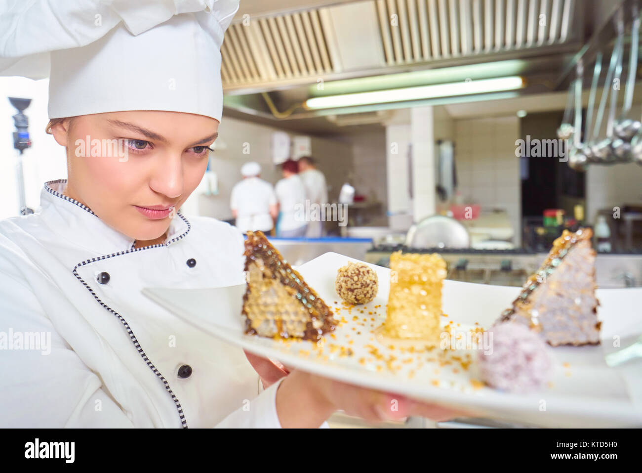 Cake on white cooking board. Honey cake prepared by chef. Sweet dessert ...