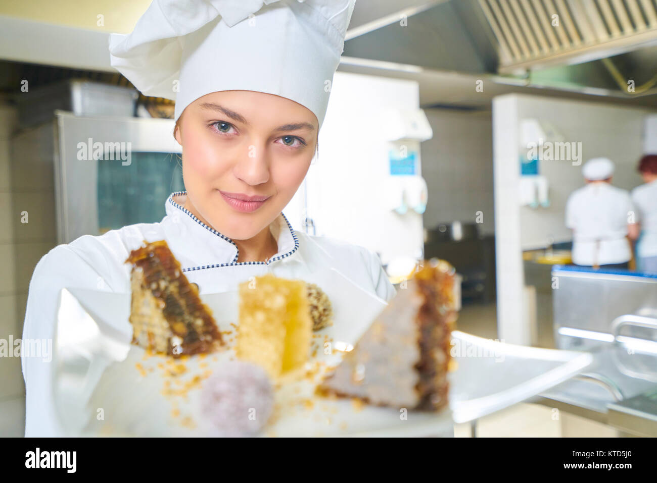 Cake on white cooking board. Honey cake prepared by chef. Sweet dessert ...