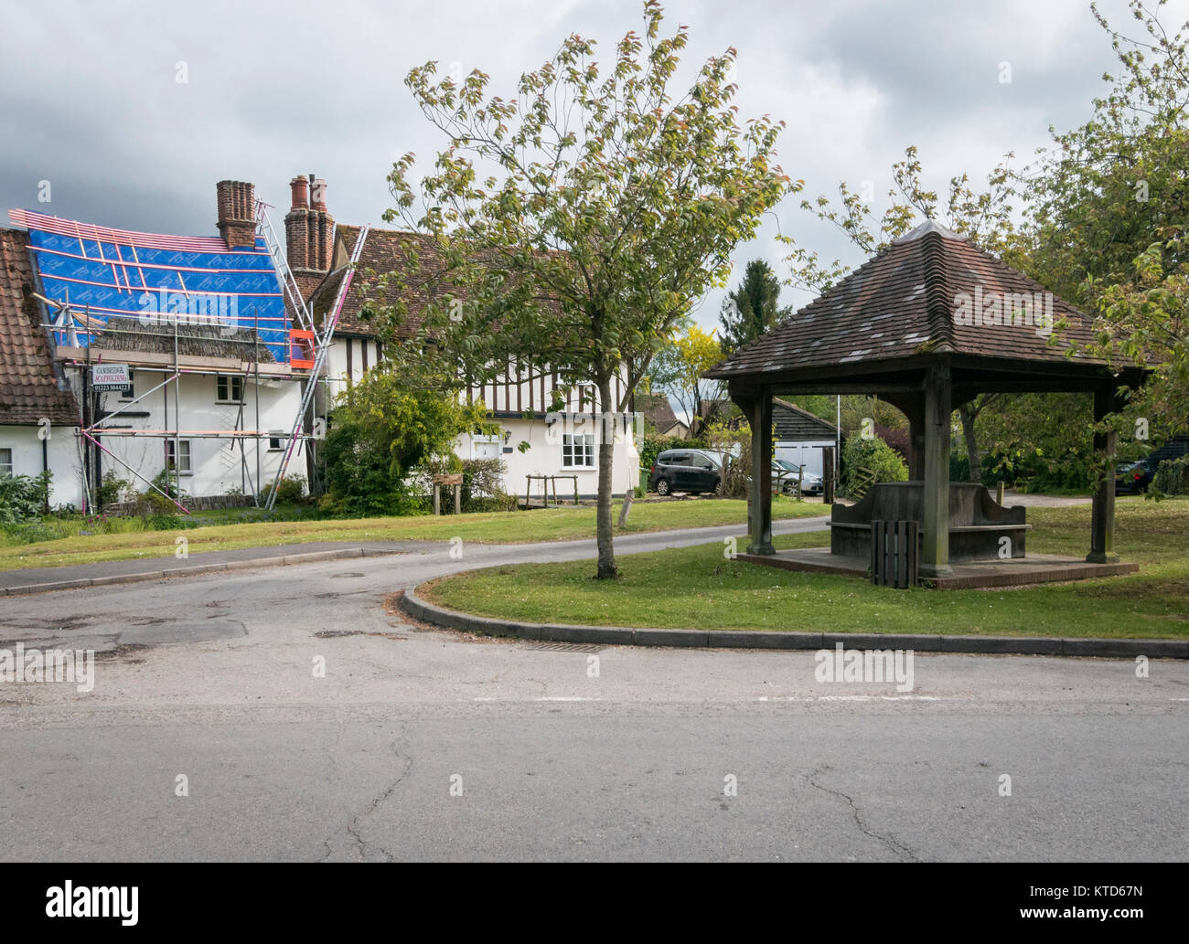 Shelter and cottages on The Green in the village of Foxton ...