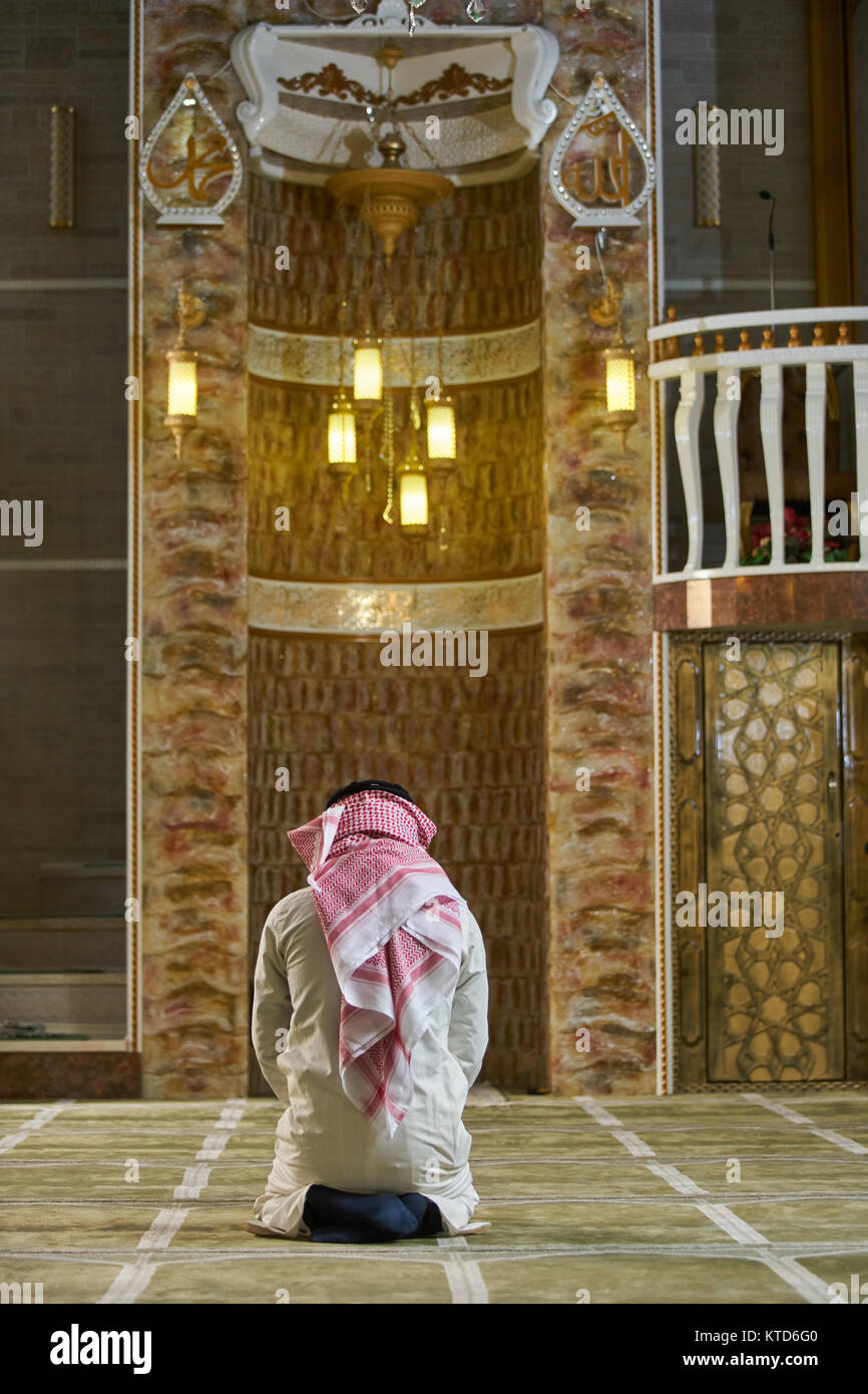 Religious muslim man praying inside the mosque Stock Photo - Alamy