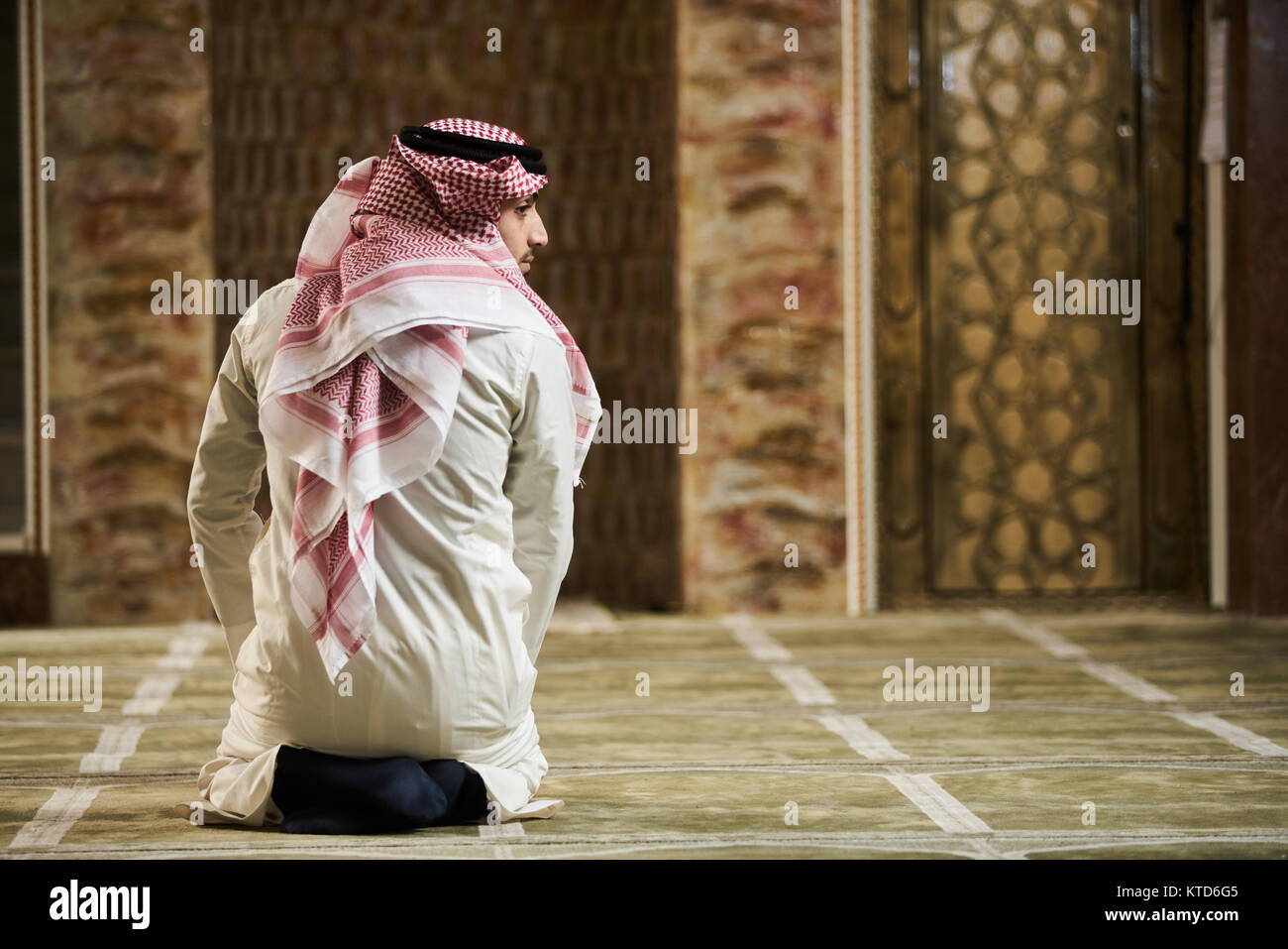 Religious muslim man praying inside the mosque Stock Photo - Alamy