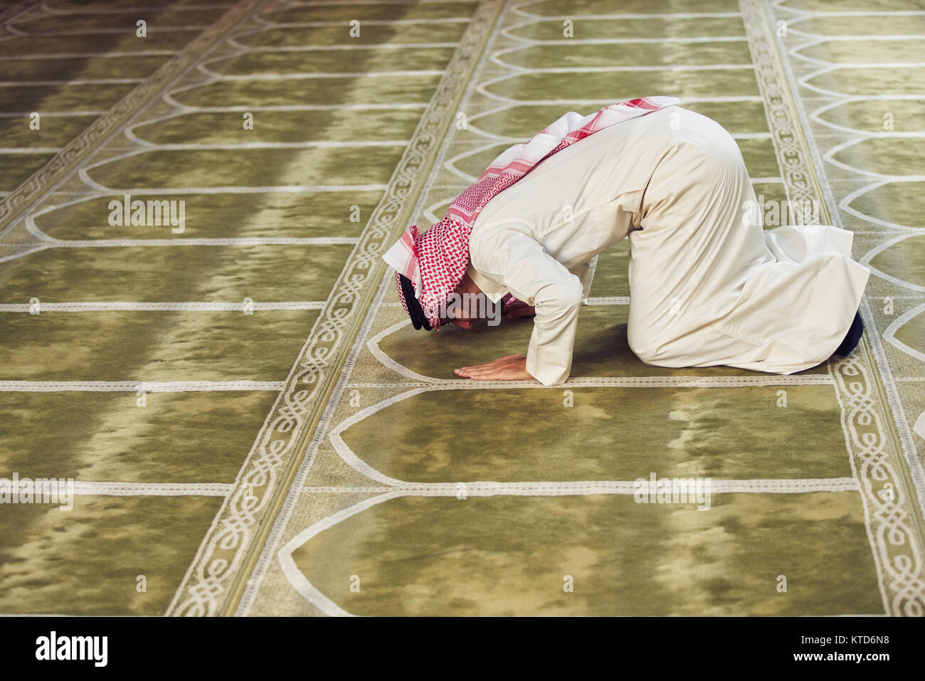 Religious muslim man praying inside the mosque Stock Photo - Alamy