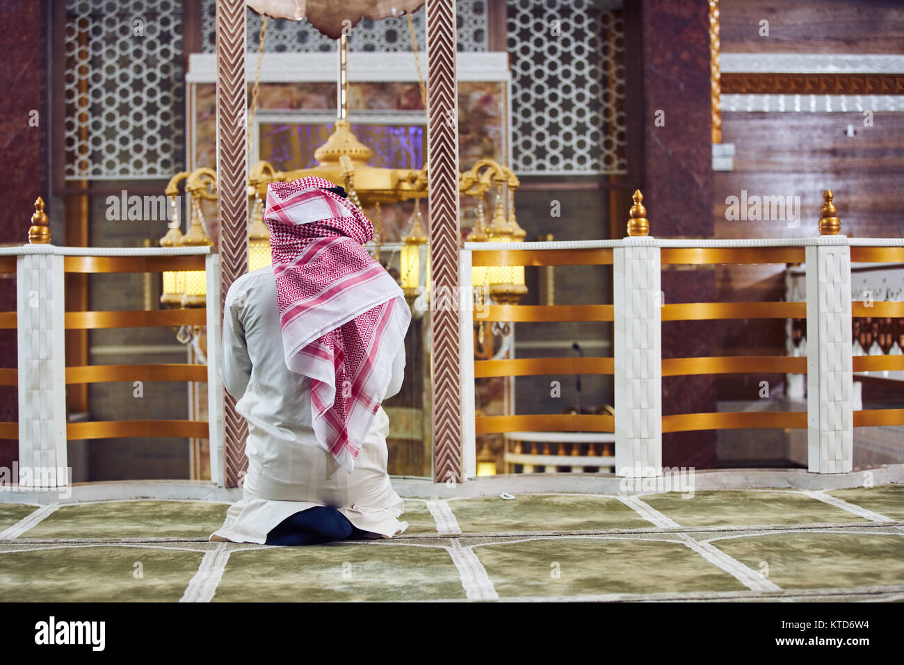 Religious muslim man praying inside the mosque Stock Photo - Alamy