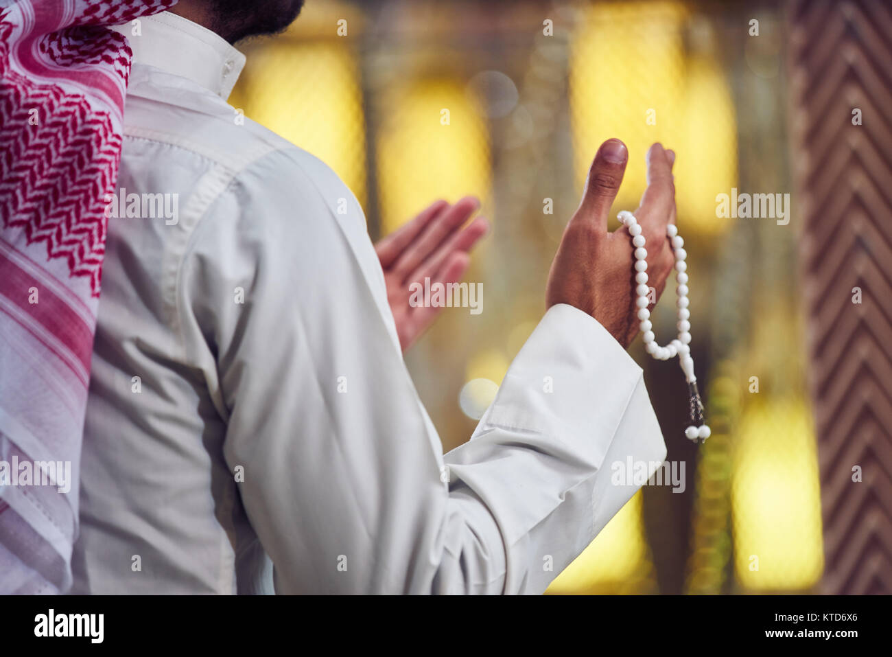 Religious muslim man praying inside the mosque Stock Photo - Alamy