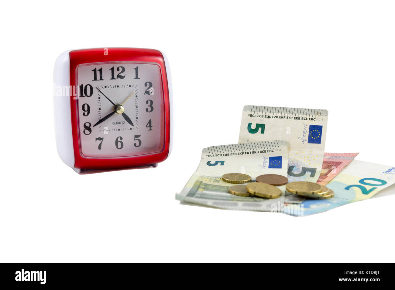 clock with money in white background Stock Photo - Alamy