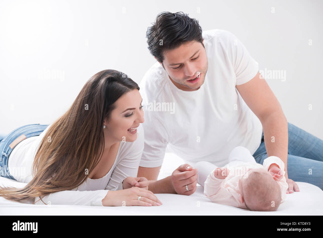 An image of a happy family of three Stock Photo - Alamy