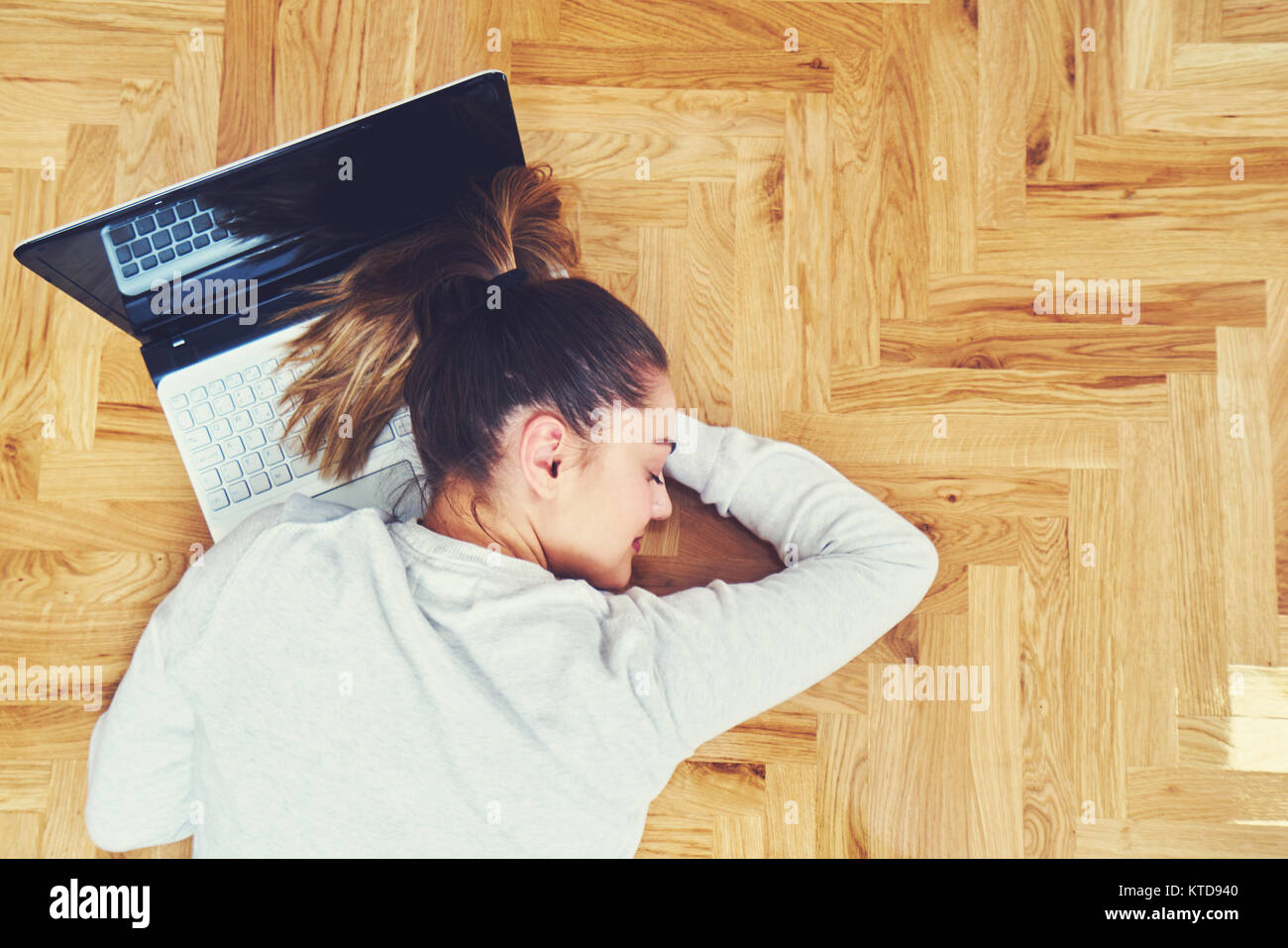 A woman sleeping on the Laptop Stock Photo - Alamy