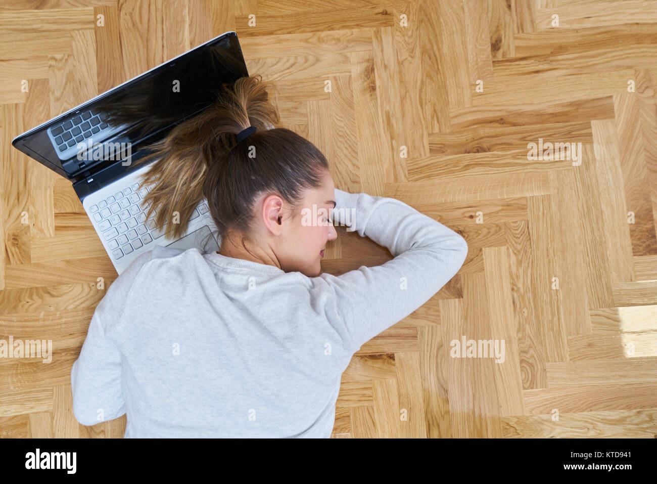 A woman sleeping on the Laptop Stock Photo - Alamy