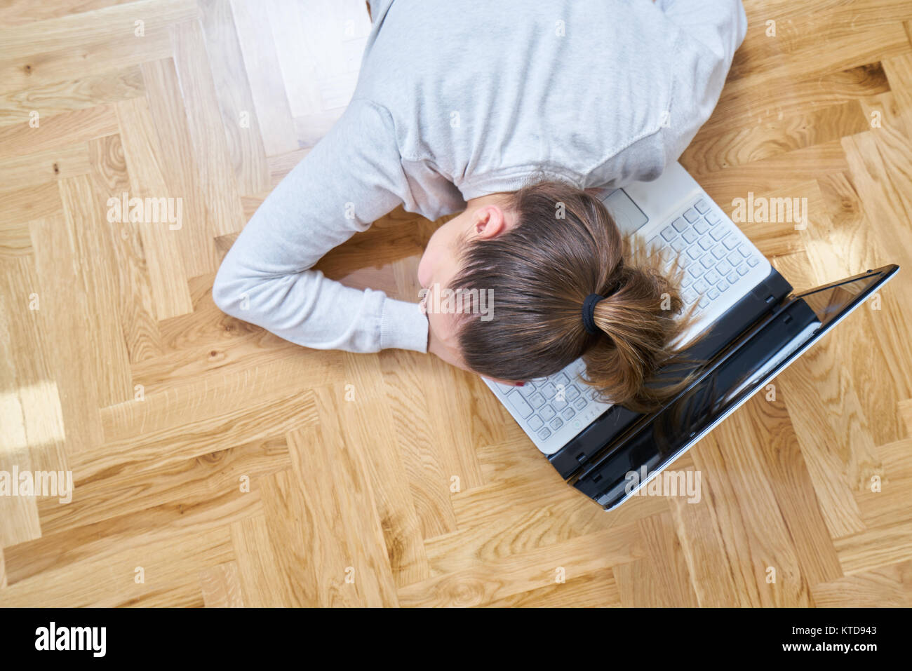 A woman sleeping on the Laptop Stock Photo - Alamy