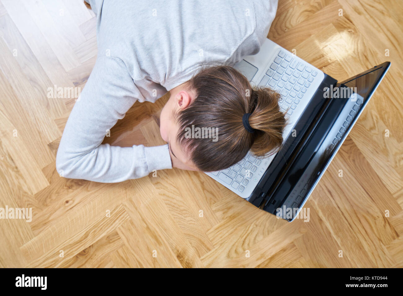 A woman sleeping on the Laptop Stock Photo - Alamy