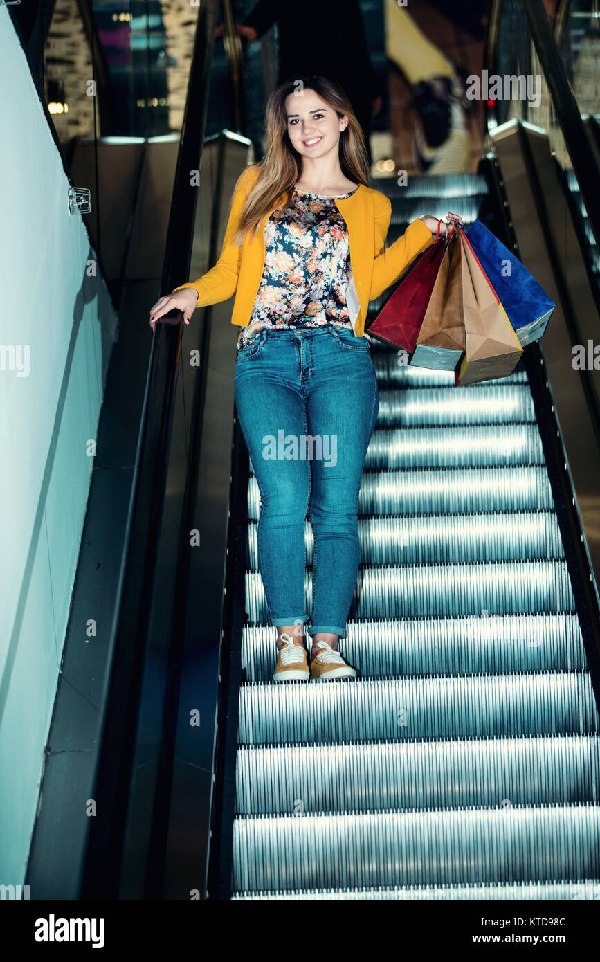 Happy girls shopping in late autumn. bags, walking, holidays Stock ...