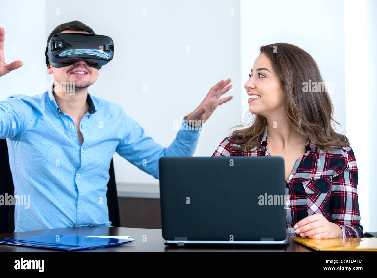 Young people having fun at startup metting discusting ideas Stock Photo ...