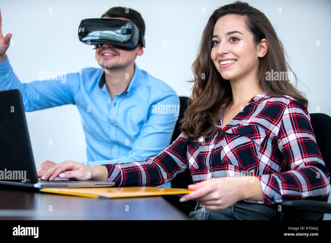 Young people having fun at startup metting discusting ideas Stock Photo ...