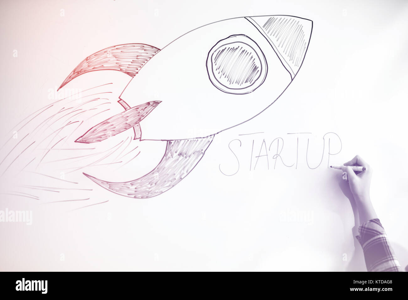 Startup rocket on whiteboard, concept Stock Photo - Alamy