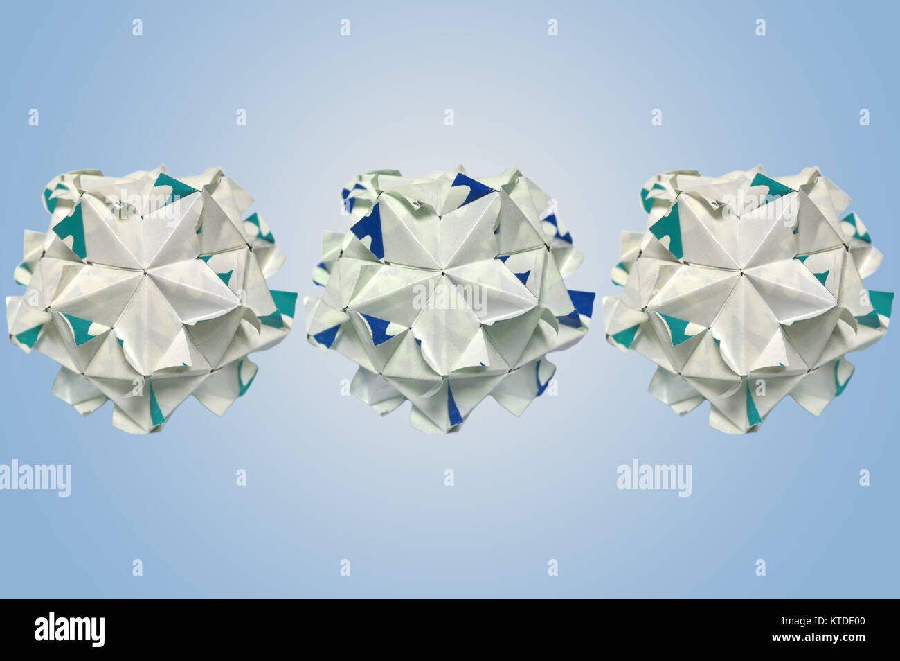 Modular origami on blue background Stock Photo - Alamy