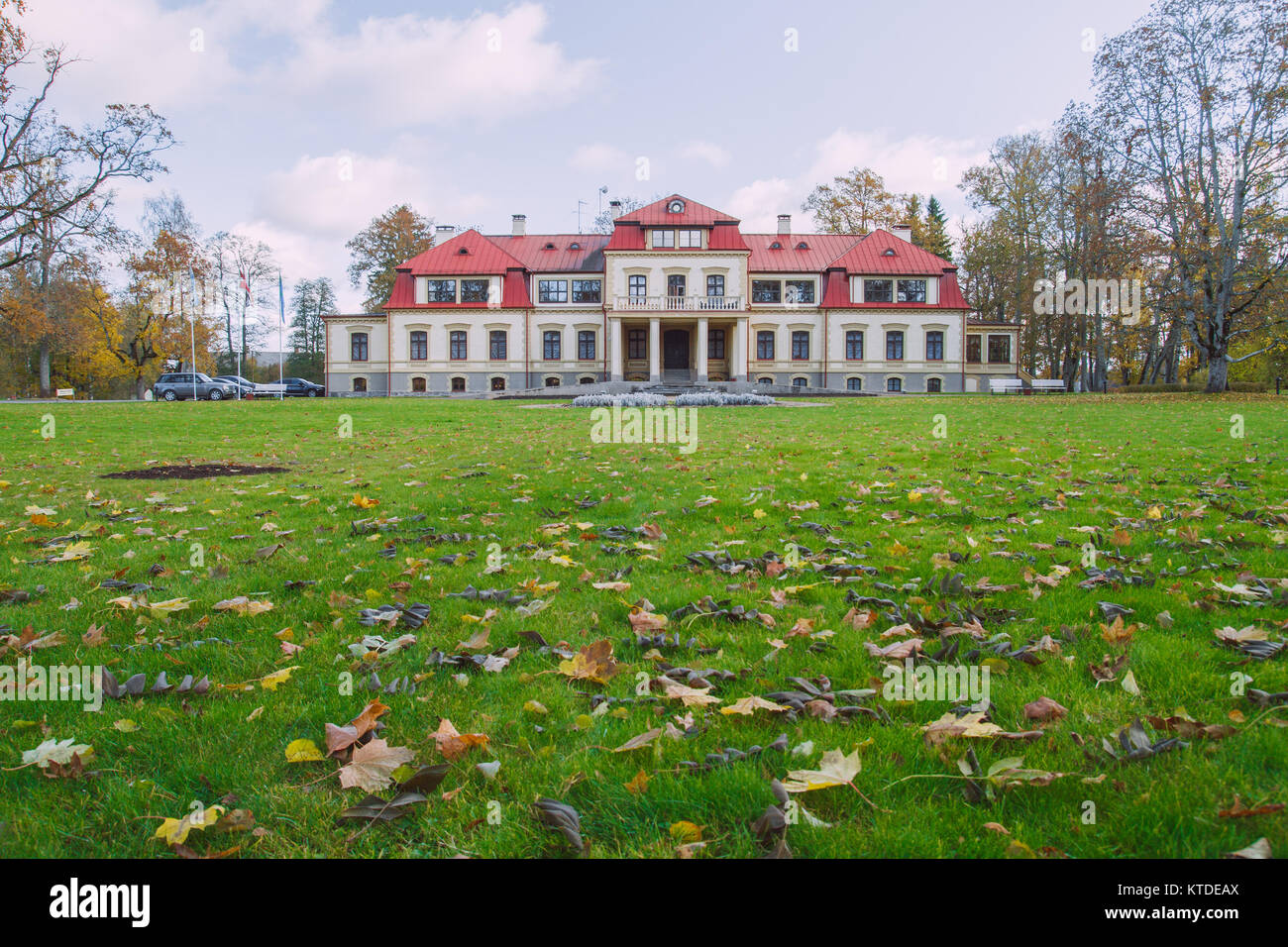 Old manor at city Valmiera, Latvia. Green garden in autumn. Travel ...