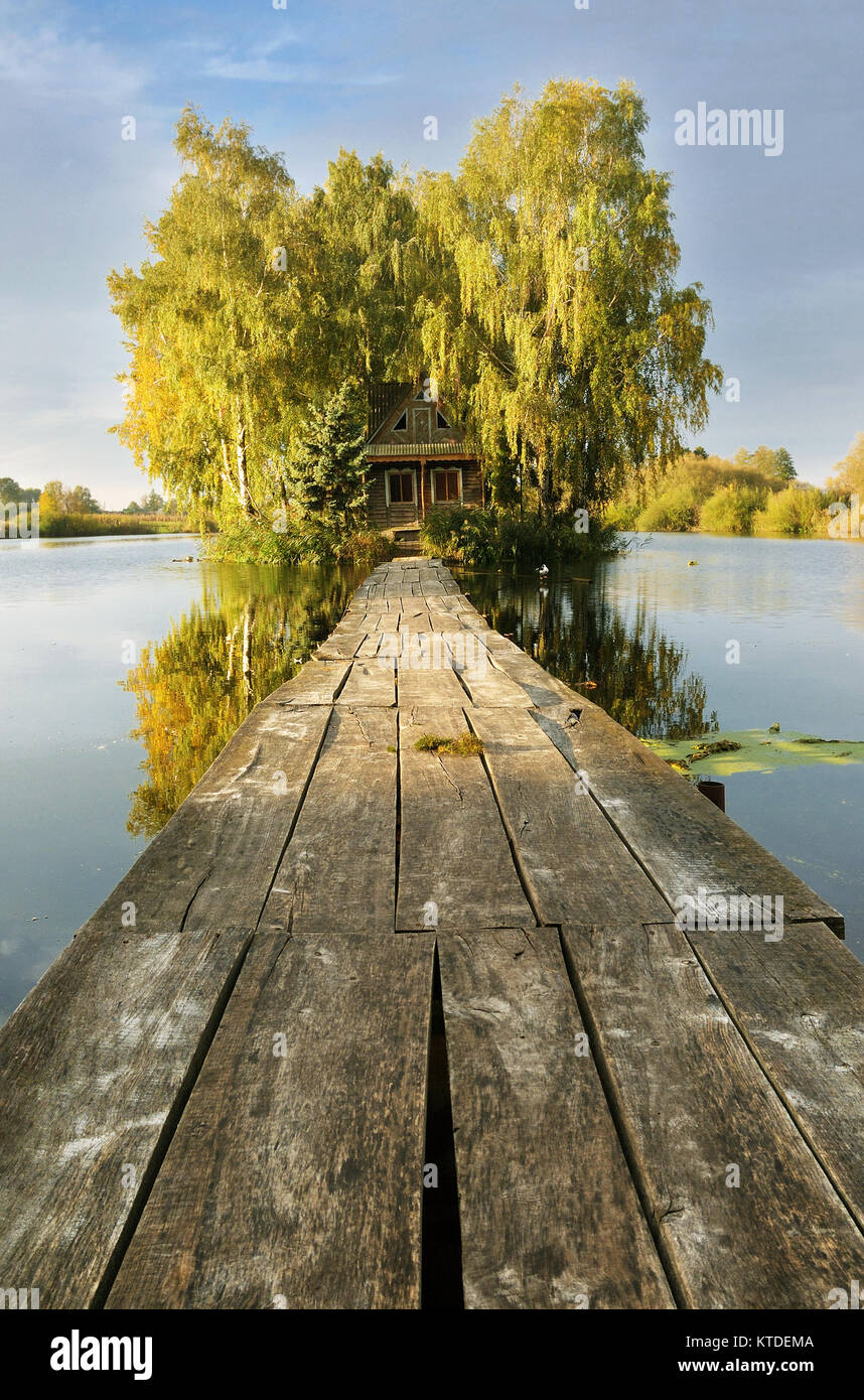 small house. a picturesque hut on a small island Stock Photo - Alamy