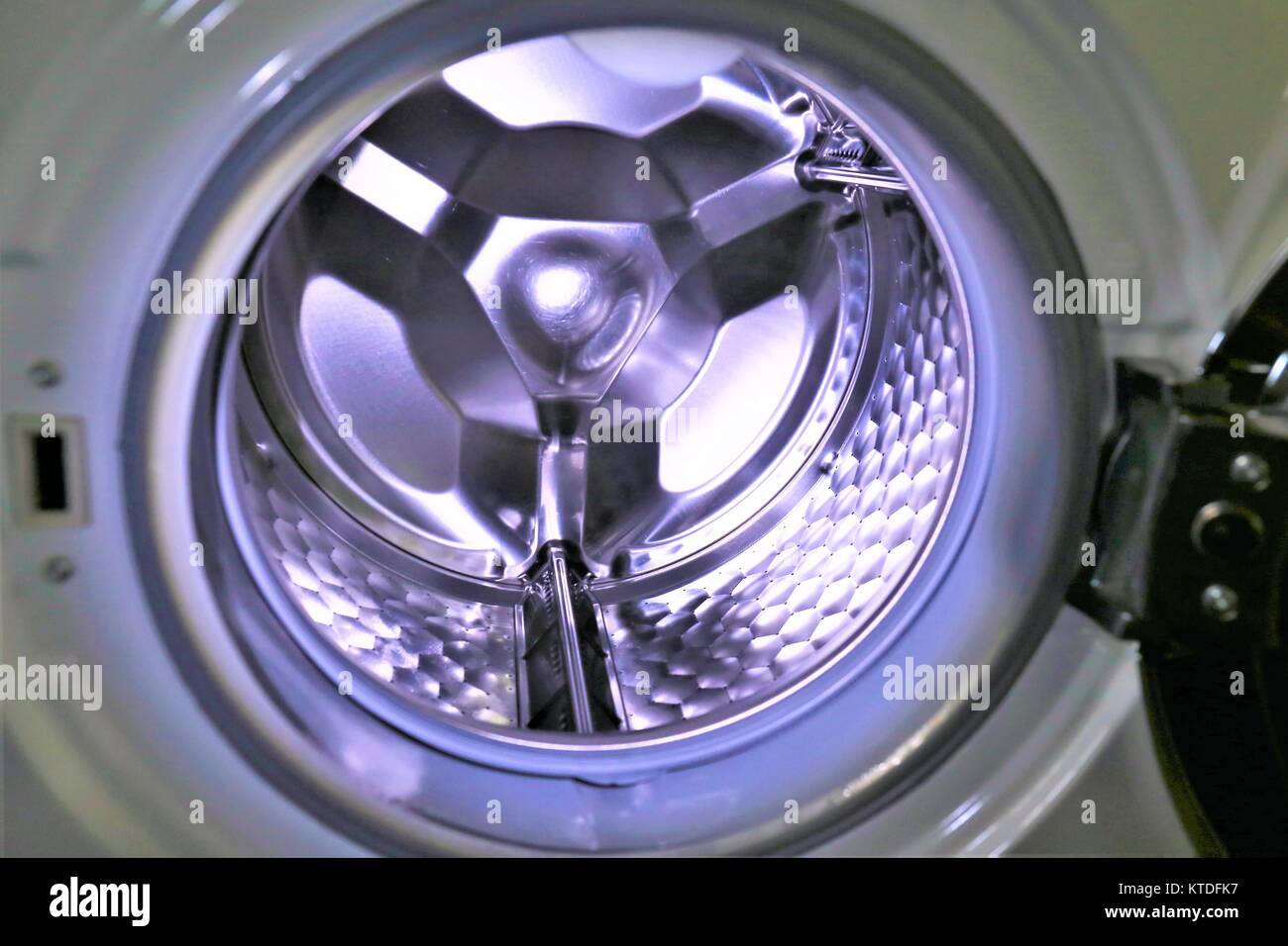 An image of a look inside a wash machine Stock Photo - Alamy