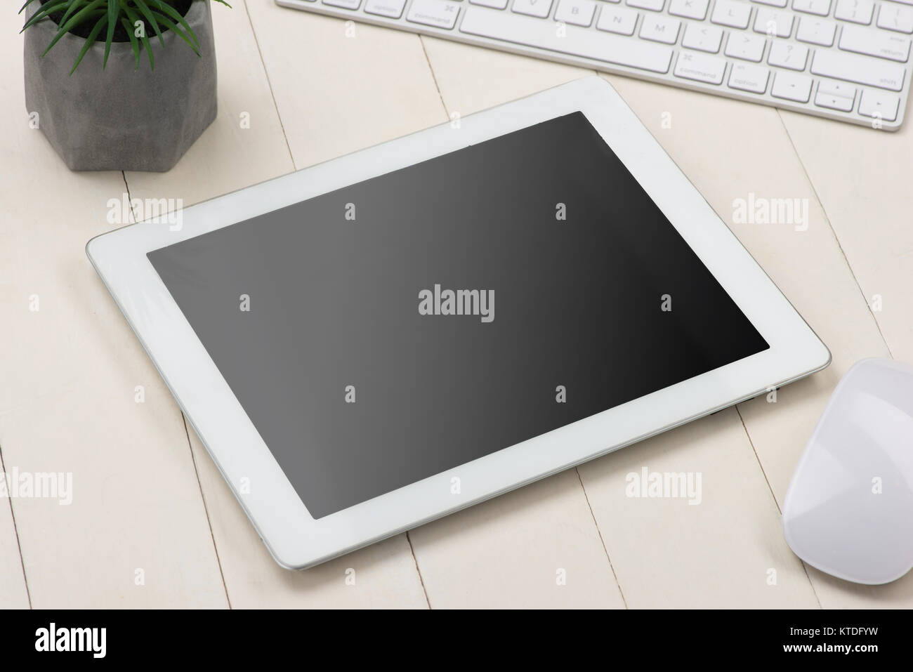 Office work table with digital tablet screen mock up Stock Photo - Alamy