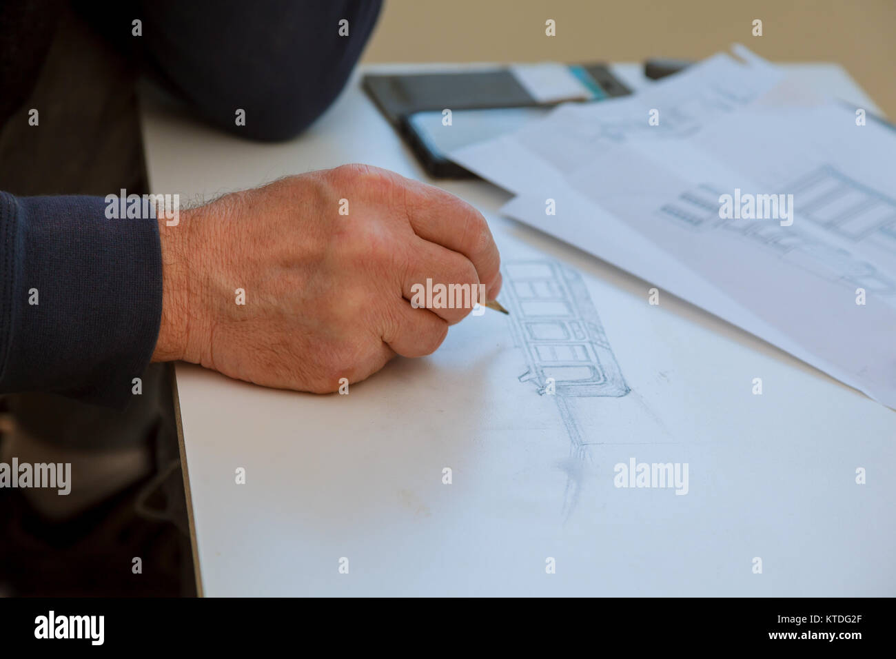 Architects working on blueprint, real estate project. Architect ...