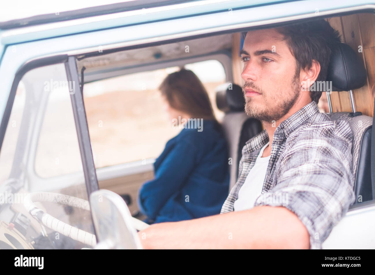 Young couple inside a van Stock Photo - Alamy