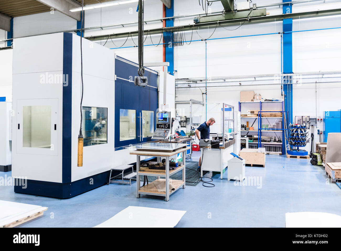 Man working in factory shop floor Stock Photo - Alamy