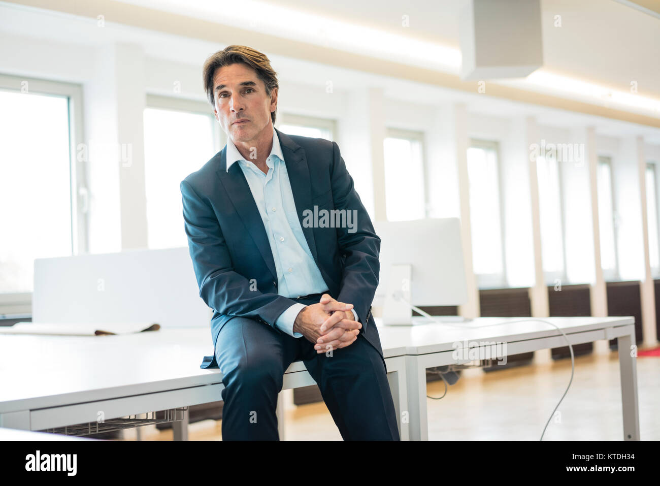 Businessman in office table hi-res stock photography and images - Alamy