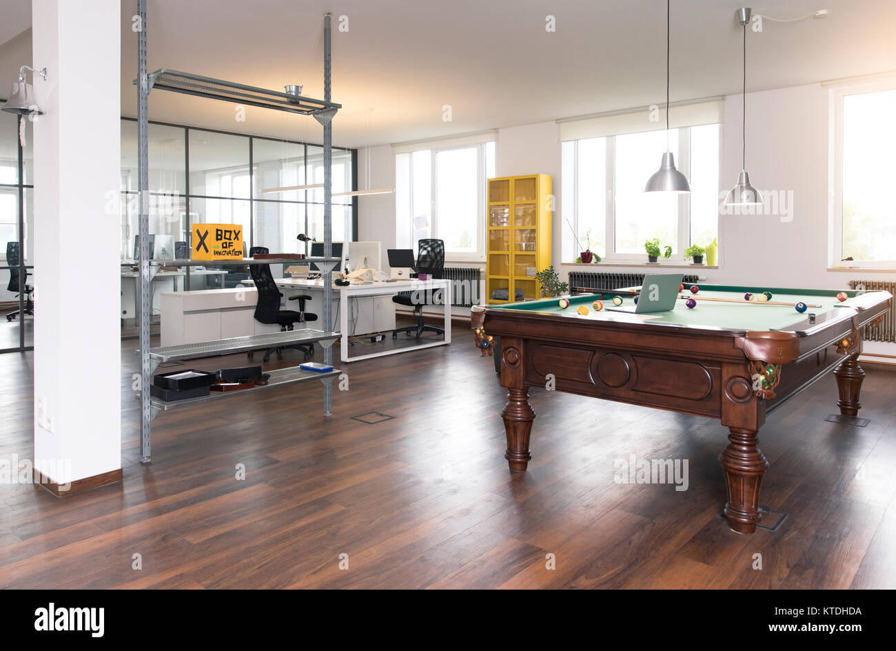 Pool table in modern open space office Stock Photo - Alamy