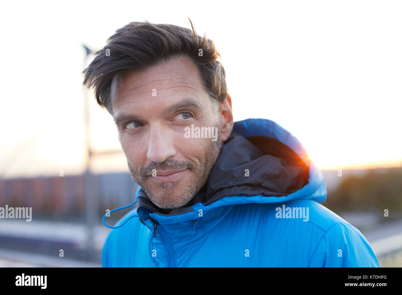 Man in light blue jacket hi-res stock photography and images - Alamy