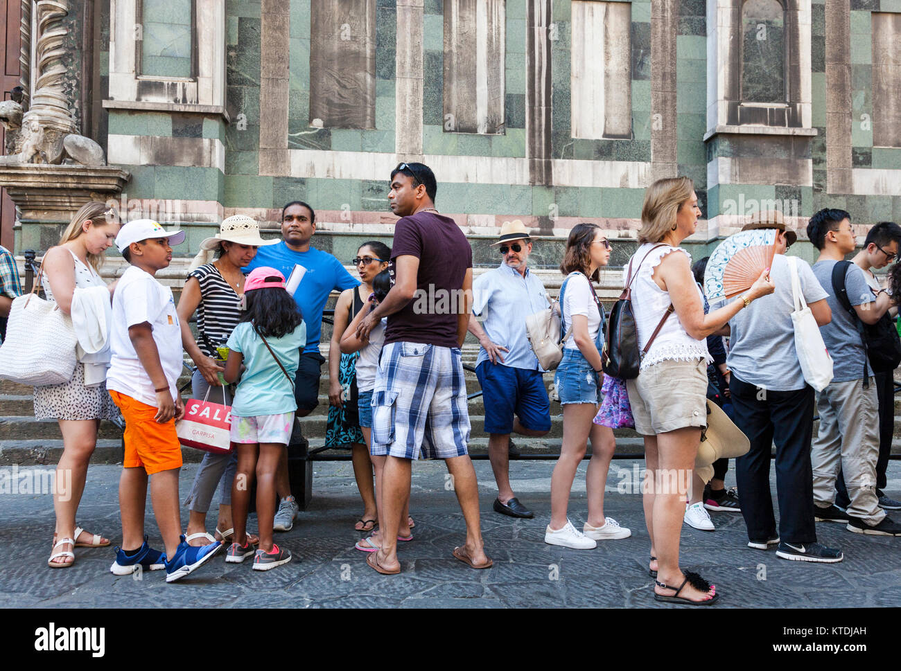 Tourists waiting in line, Florence, Italy Stock Photo - Alamy
