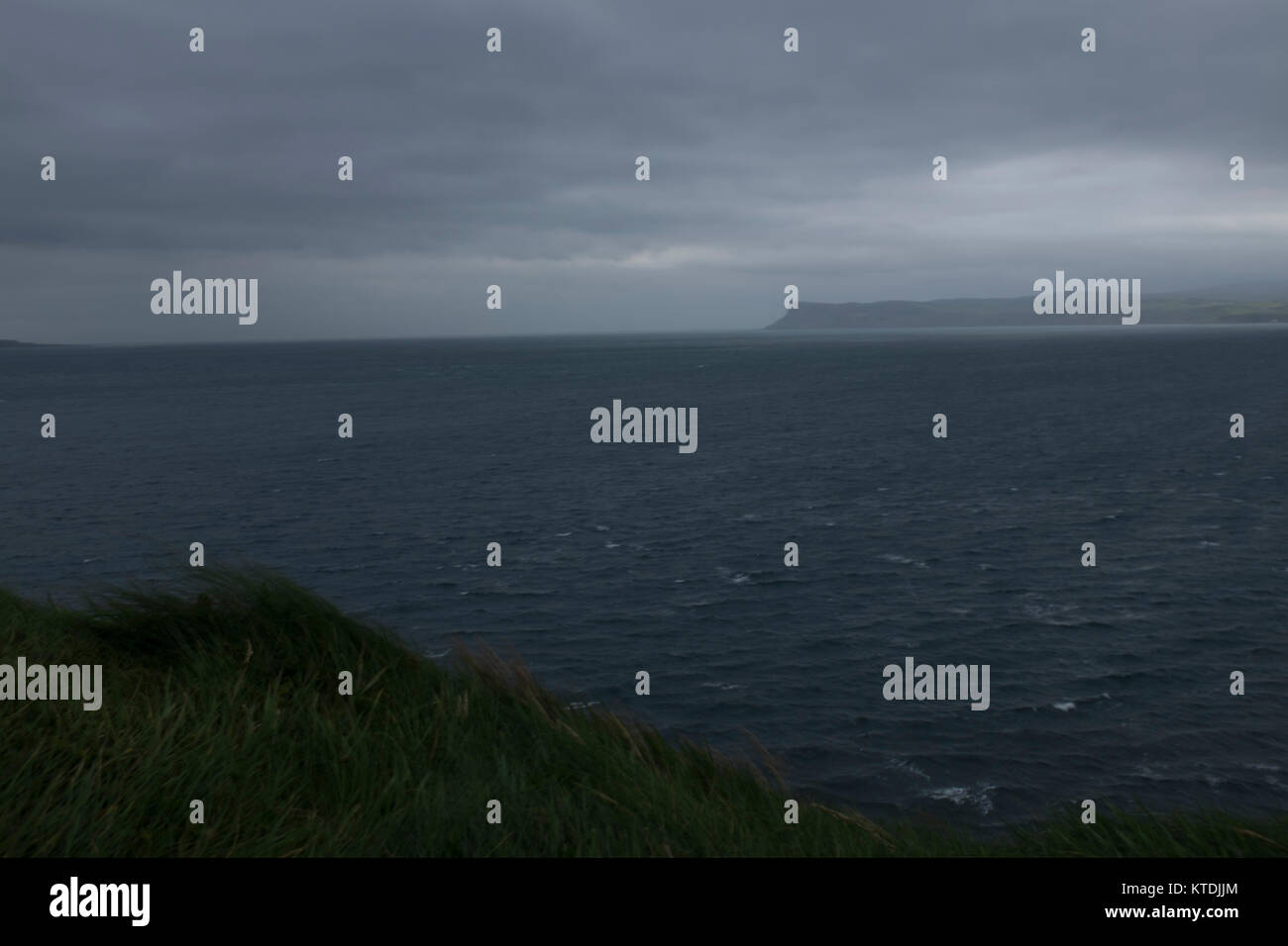 View from the Torr Head to the stormy sea in Northern Ireland Stock ...
