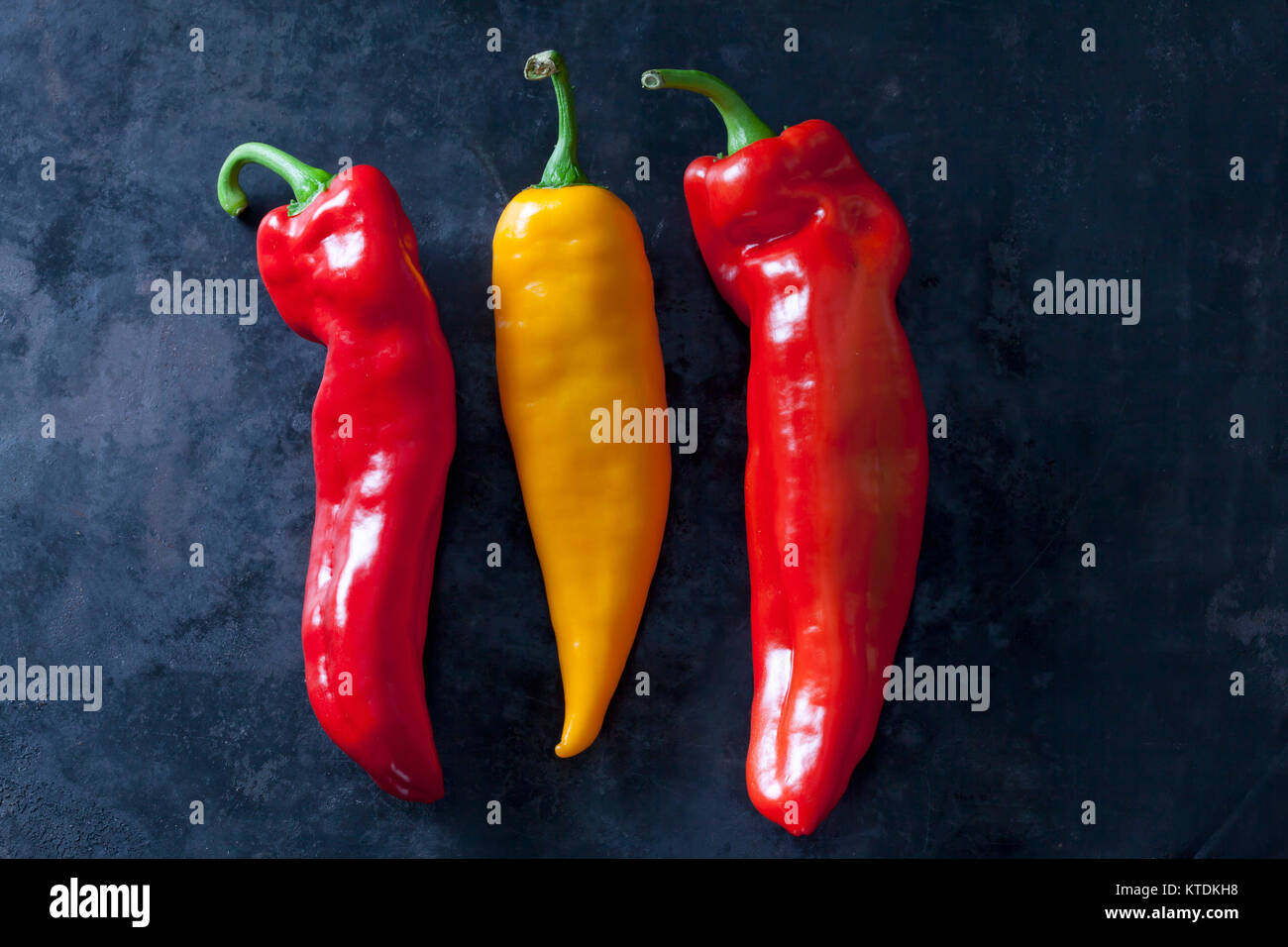 Red and yellow pointed peppers Stock Photo - Alamy