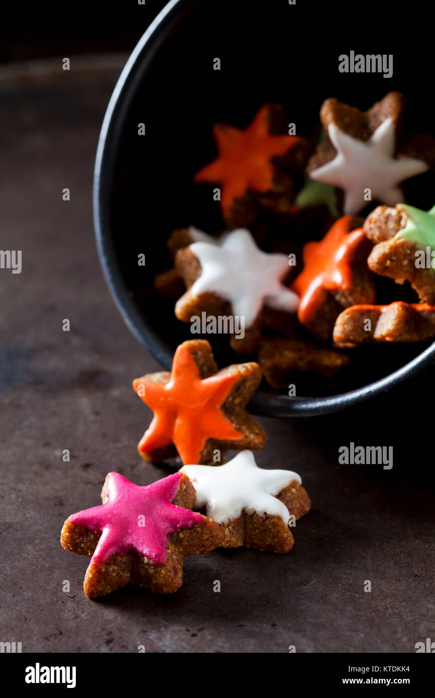 Home-baked coloured cinnamon stars Stock Photo - Alamy