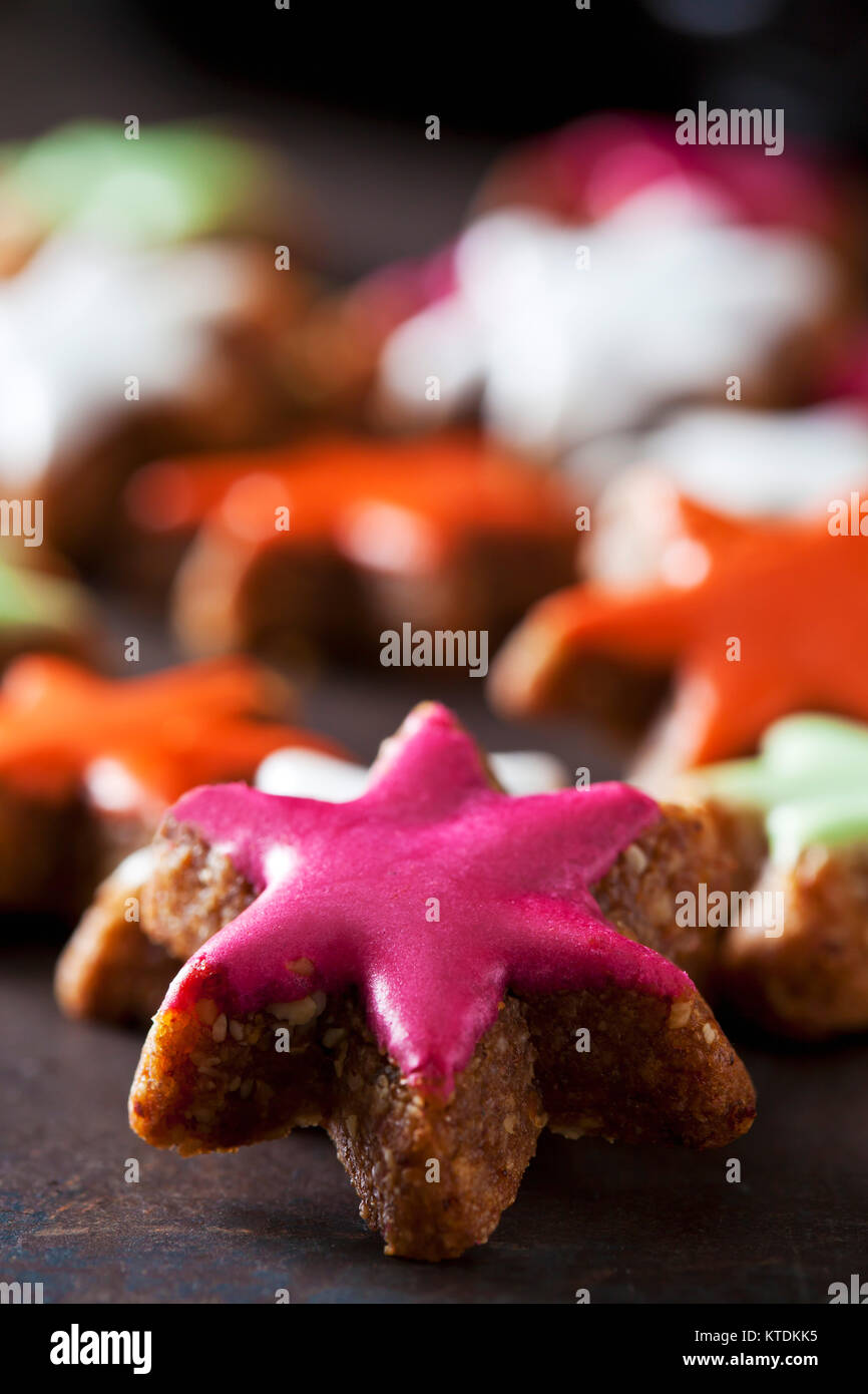 Home-baked coloured cinnamon stars Stock Photo - Alamy