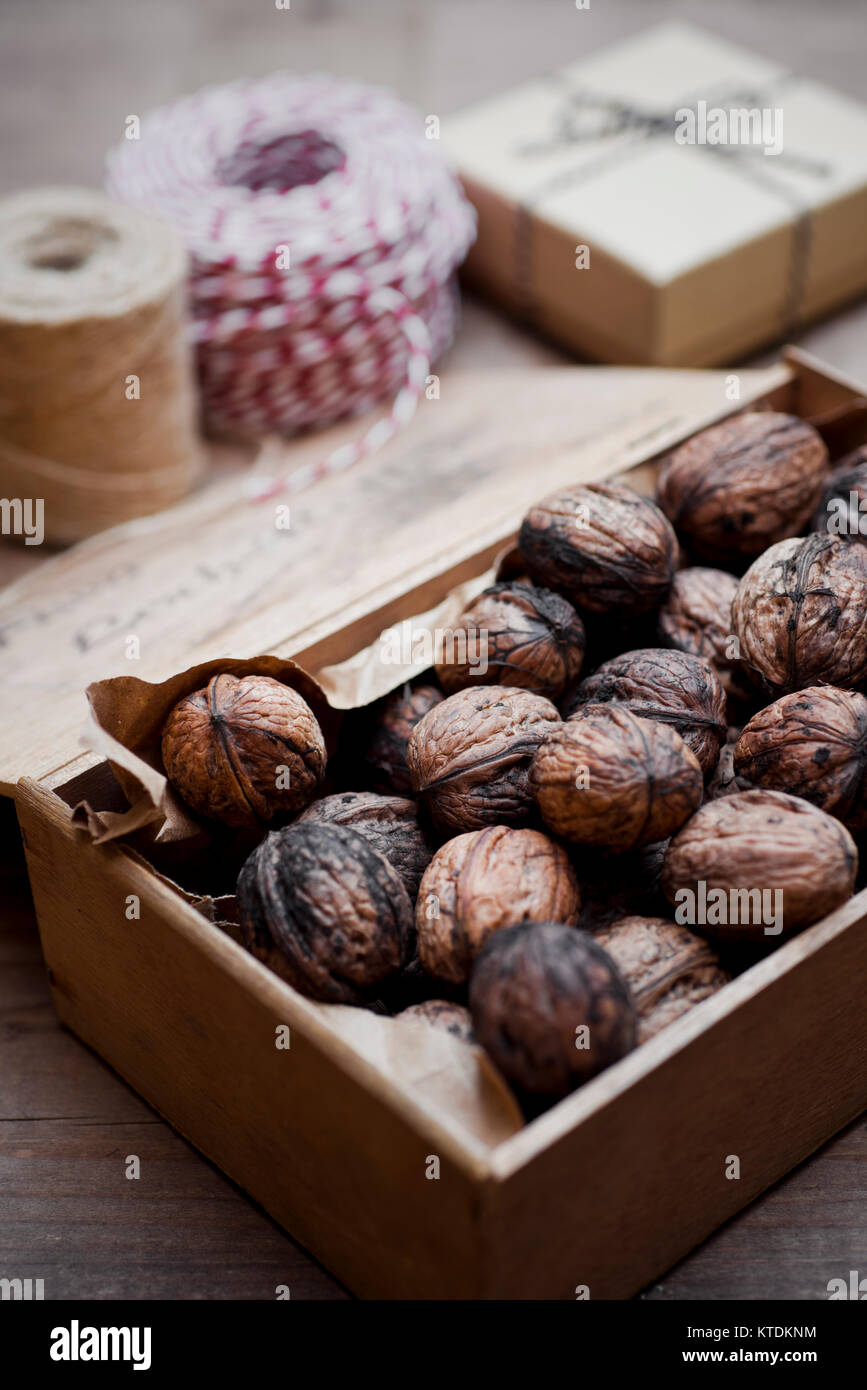 Wooden box of organic walnuts Stock Photo - Alamy